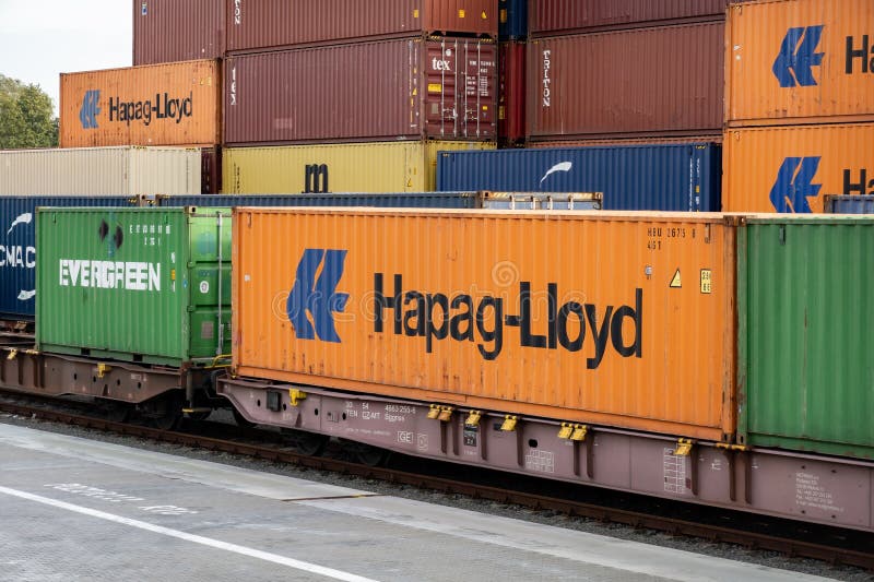 Train with Hapag-Lloyd and Evergreen Container Waggons in Terminal ...