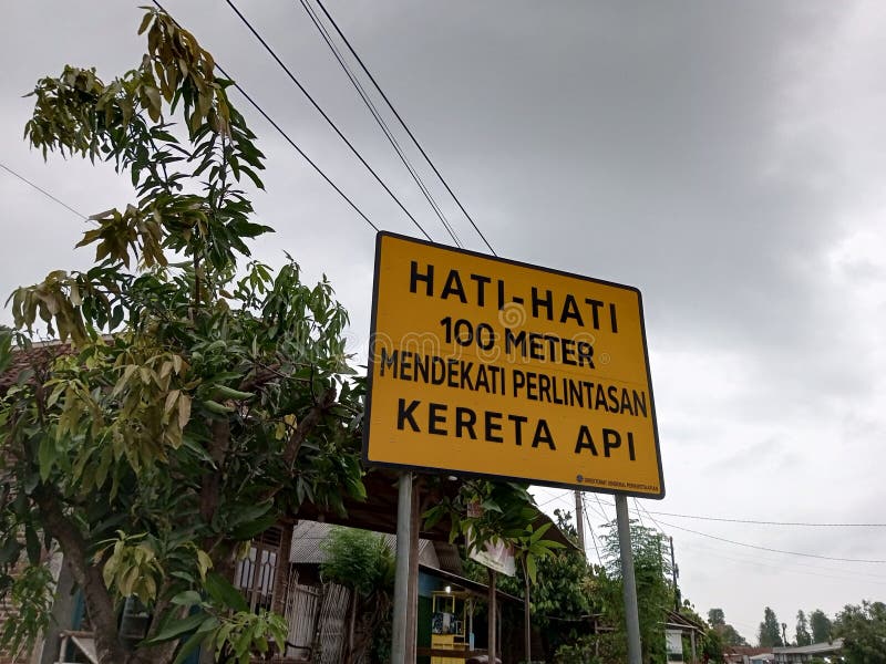Train Information Sign with Yellow Board and Black Ink Stock Image ...