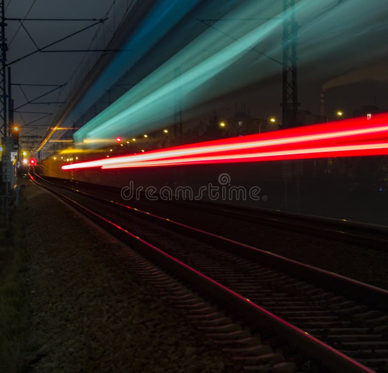 Train Light Trail with Red and Blue Light, Long Exposure Stock Photo ...