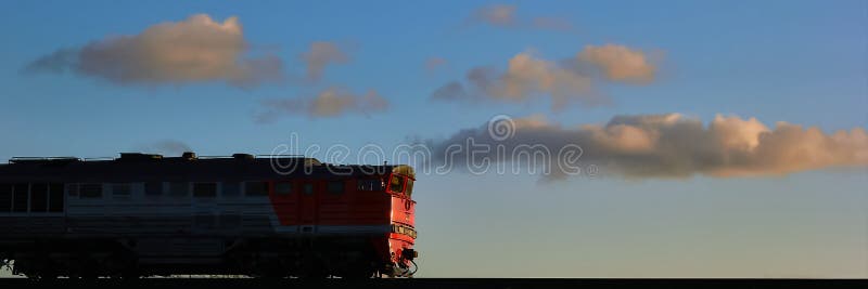 Train Locomotive Rides Against a Blue Sky Stock Photo - Image of road ...