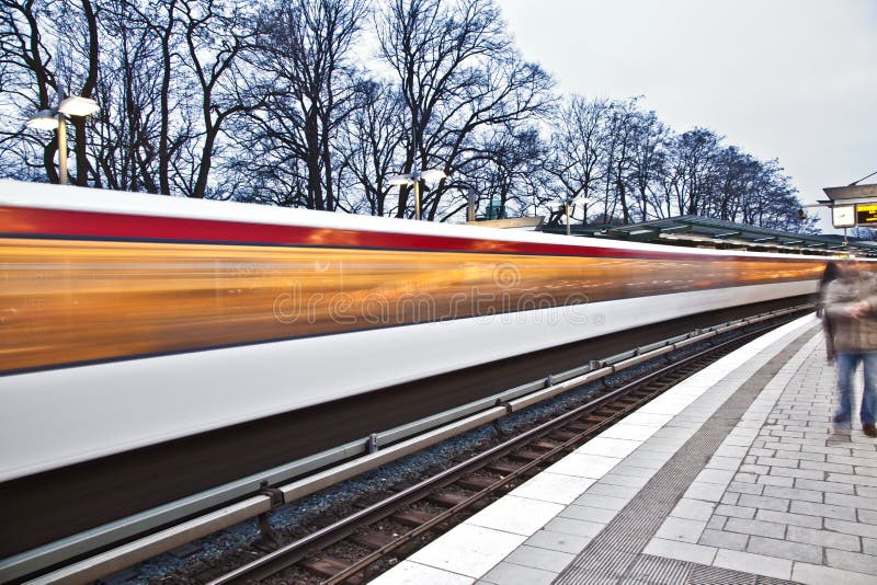 Train in motion stock image. Image of publiv, illuminated - 17999329