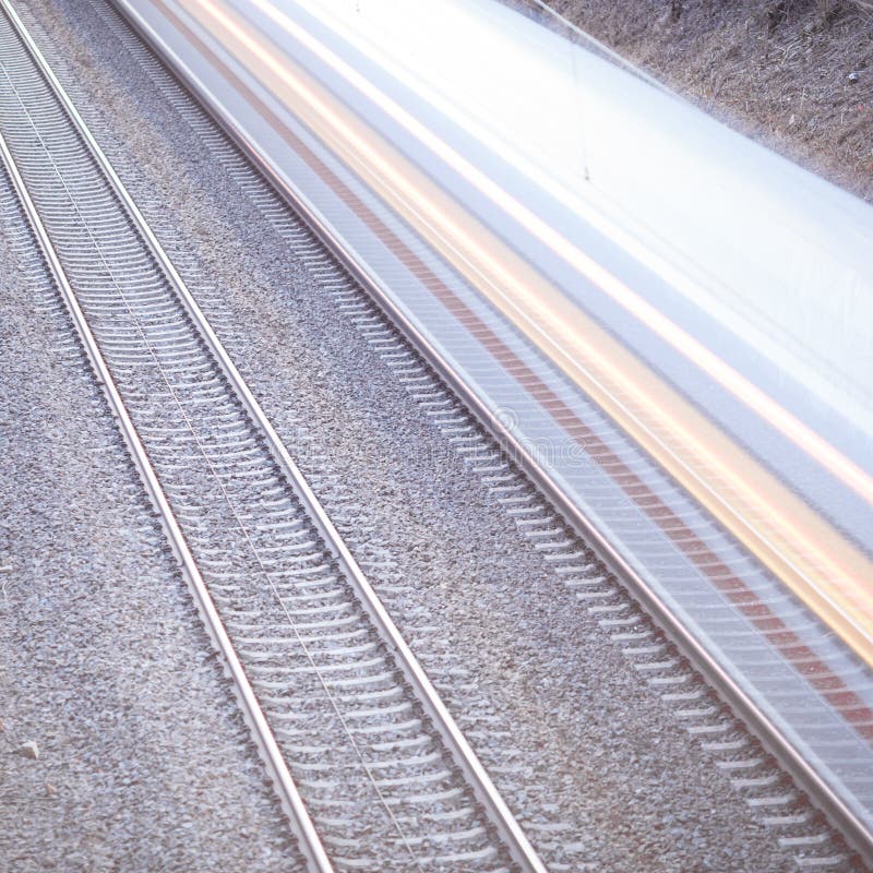Train with motion on rails stock photo. Image of rail - 37762118