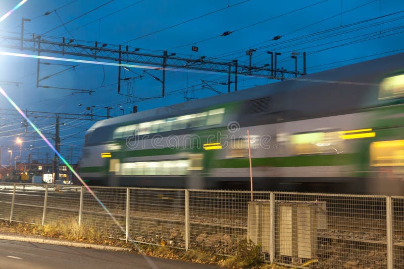 Train in Motion on the Station at Night, Long Exposure Photo Stock ...