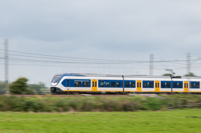 Train Moving Fast in Landscape Stock Image - Image of cargo, electric ...