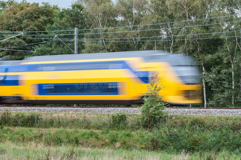 Train Moving Fast in Landscape Stock Photo - Image of railway ...