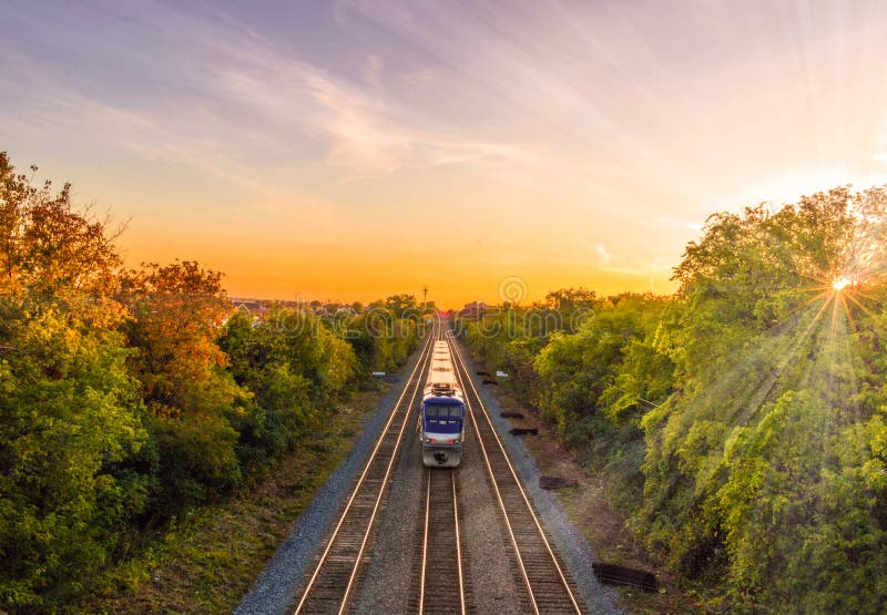 Train through the Nature during a Warm Sunset Stock Image - Image of ...