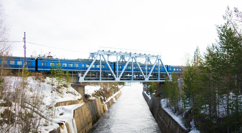 Train over the river stock photo. Image of train, snow - 52840224