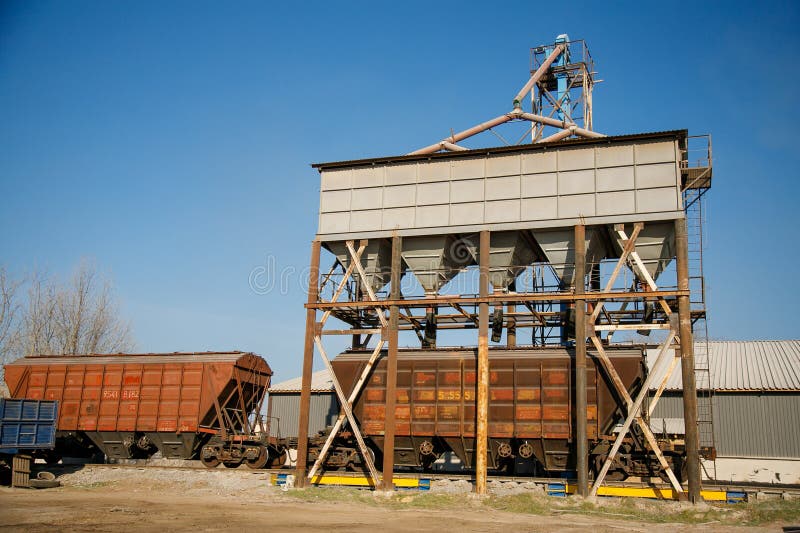 Train is Parked Next To Building with Lot of Rust Stock Photo - Image ...