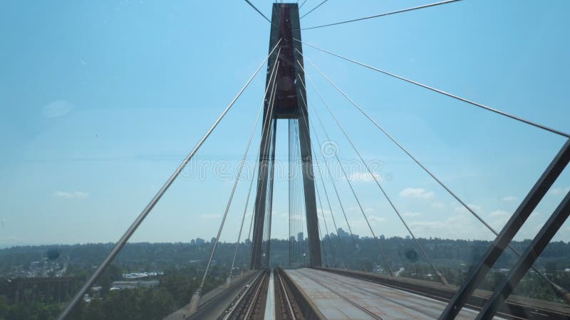 The Train Passes Over the Bridge. View from the Rear Window of a Moving ...