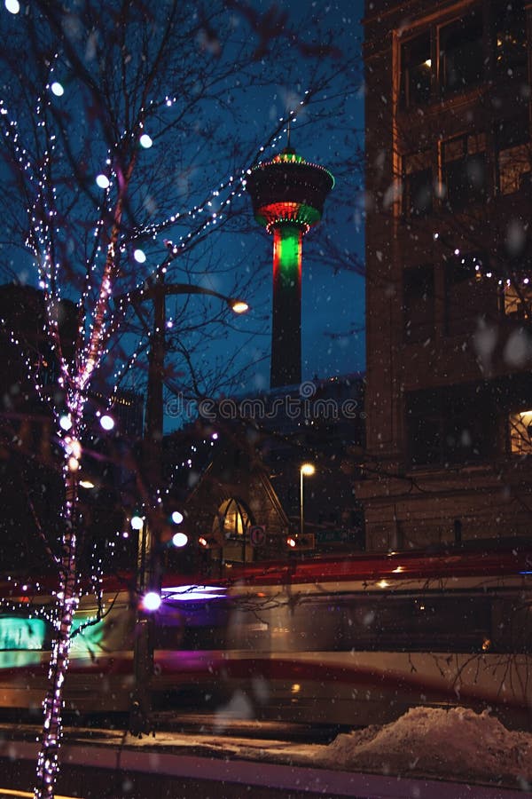 Train Passing by the Calgary Tower at Night Stock Image - Image of ...