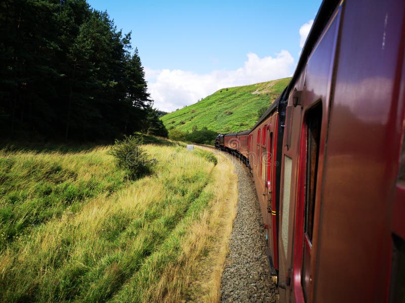 Train Passing through Countryside Stock Image - Image of woodland ...