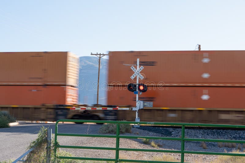 Train is Passing through a Crossing with a Red Light Stock Image ...