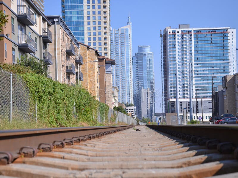 Train Passing with Downtown in the Background Editorial Photography ...