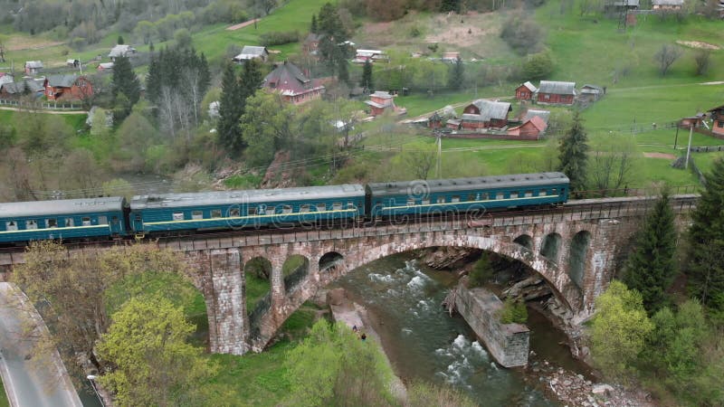 Train Passing Over Bridge. Passenger Train Crossing Old Viaduct Bridge ...