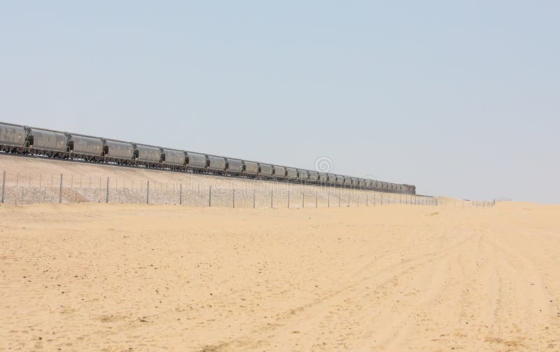Train Passing a Railway in the Desert. Editorial Photo - Image of dune ...