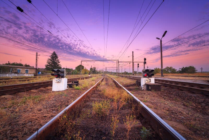 Train Platform and Traffic Light at Sunset. Railroad Stock Image ...