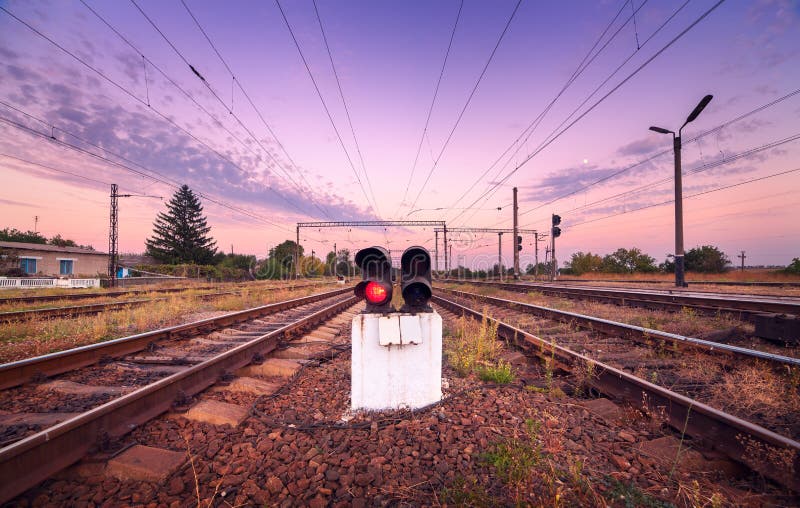 Train Platform and Traffic Light at Sunset. Railroad Stock Photo ...