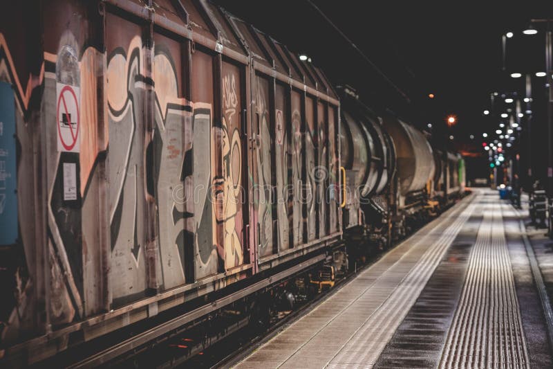 The Train is Pulled Up Next To the Platform at Night Editorial Stock ...