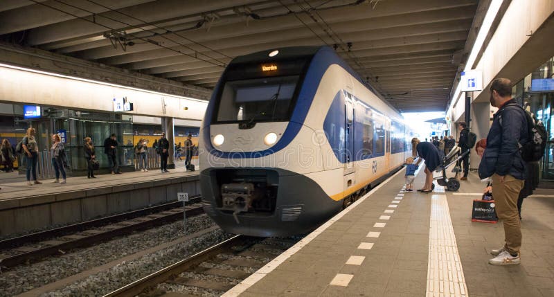 Train pulling into station stock photo. Image of pulling - 19056606