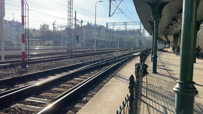Poland, Krakow, Train Pulling into Train Station Next To Loading ...