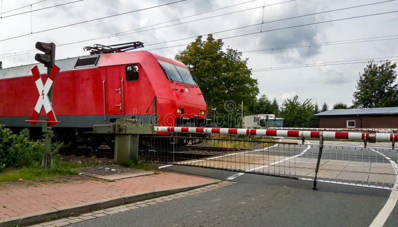 Train on Railroad Crossing in Germany Stock Photo - Image of ...