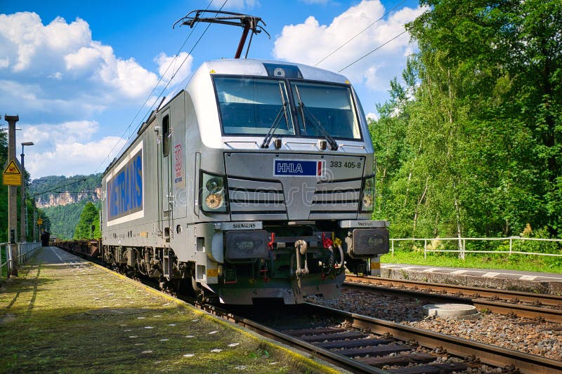 Train on Railroad Surrounded by Grass Editorial Stock Photo - Image of ...