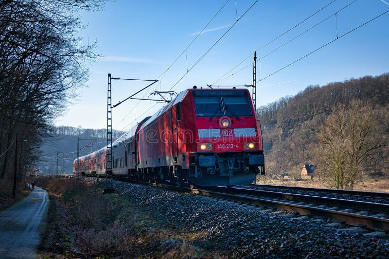 Train on Railroad Surrounded by Trees Editorial Photo - Image of ...