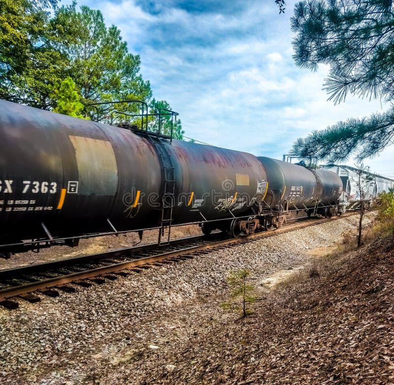 Train on railroad tracks stock image. Image of tracks - 173095193