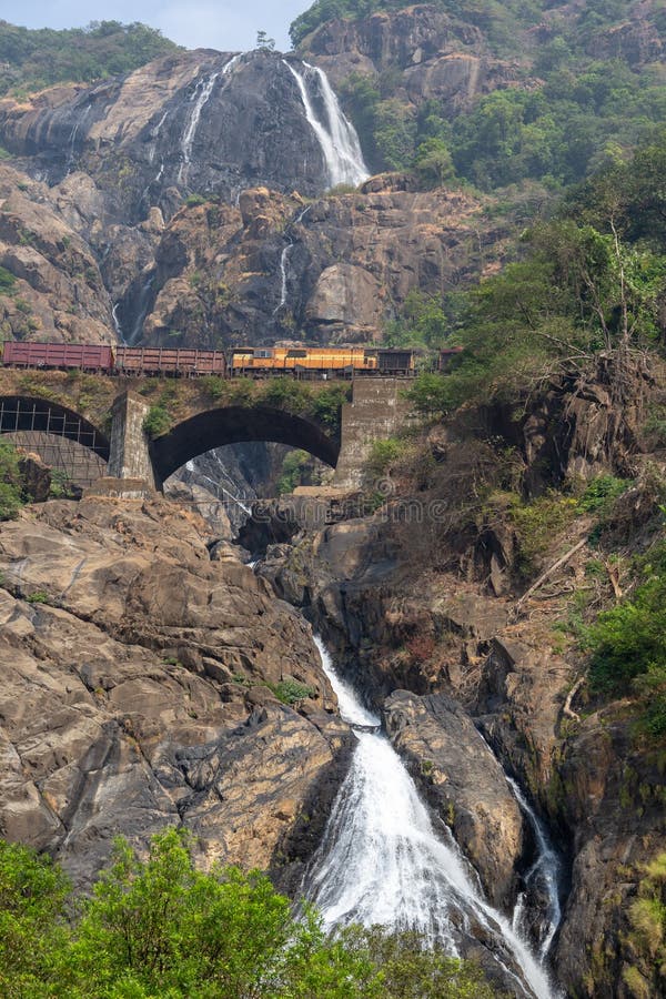 Train on the Railway Bridge on the Background of the Dudhsagar Falls ...