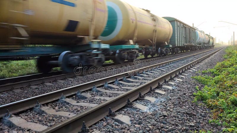 Train Rides on Rails. Freight Wagons of a Freight Train Move Along the ...