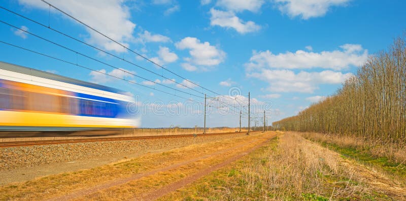 Train Riding through Nature in Sunlight Stock Image - Image of railway ...