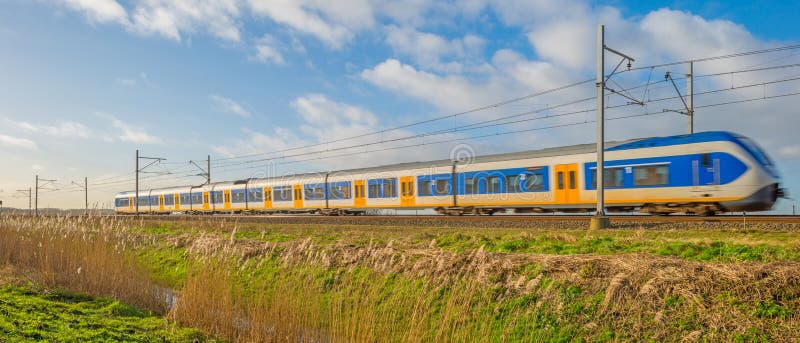 Train Riding through Nature in Sunlight Stock Photo - Image of railroad ...
