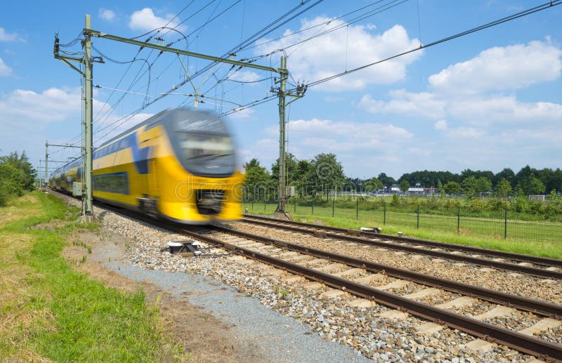 Train Riding through Nature in Sunlight Stock Image - Image of nature ...