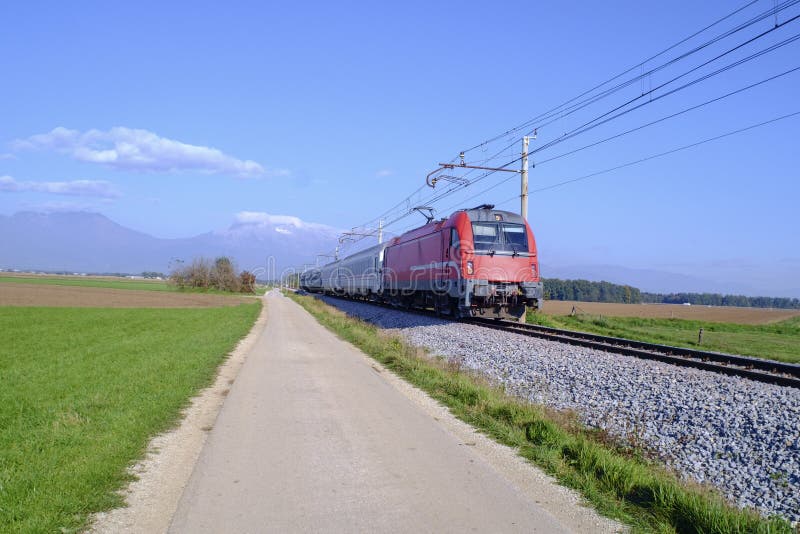 Train in rural landscape stock image. Image of iron, savinja - 98620581