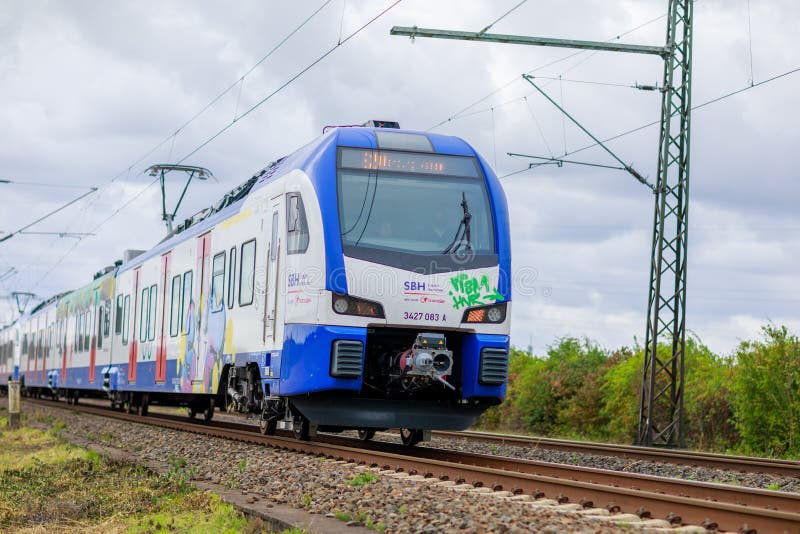 Train from SBH, Transdev S-Bahn Hannover Drives on Railroad Track in ...
