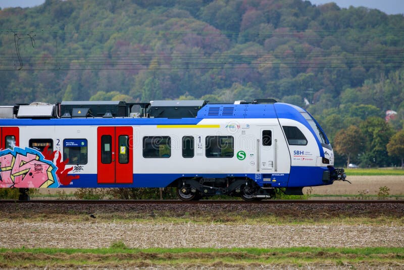 Train from SBH, Transdev S-Bahn Hannover Drives on Railroad Track in ...
