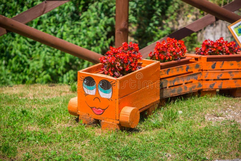 Train shaped flower vase stock photo. Image of flowers - 383970178