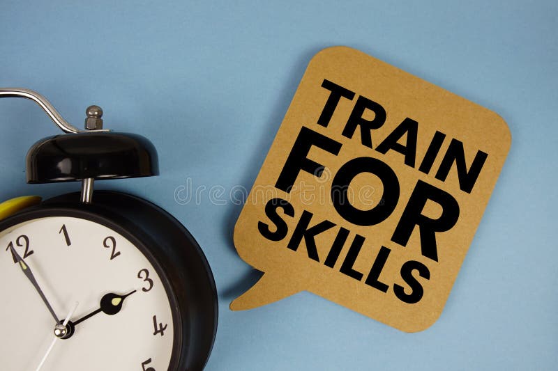Train for Skills Text with Alarm Clock on Blue Background Stock Photo ...