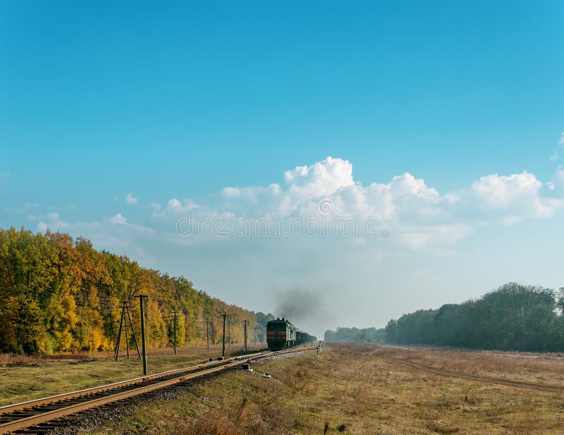 Train with smoke over it stock image. Image of iron, blue - 31409301