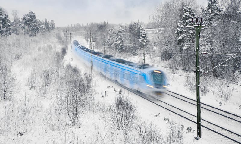Train in snow stock image. Image of railway, blue, blur - 28677937