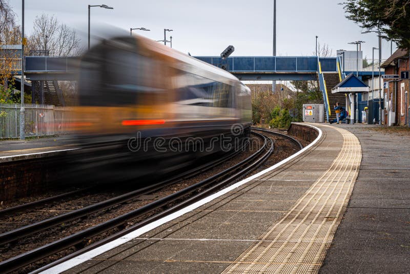 Train Speeding through Redbridge Station Editorial Image - Image of ...
