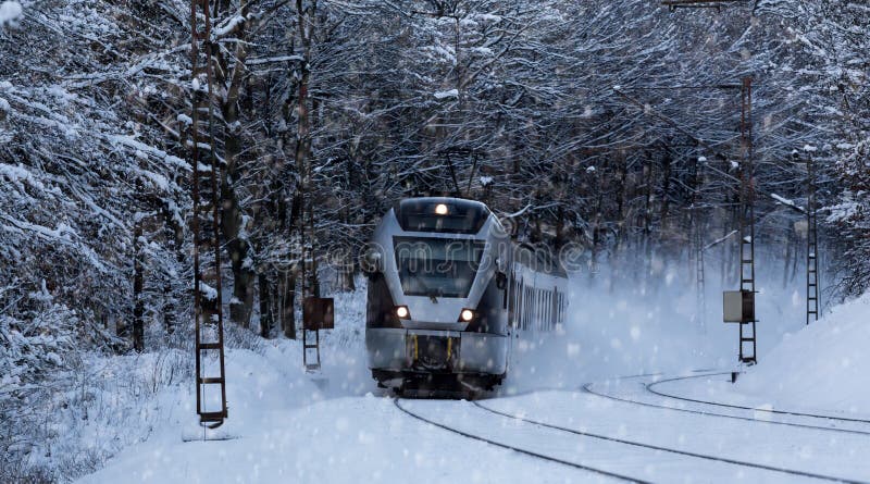 Train Speeding in a Snowy Winter Night Stock Image - Image of speeding ...