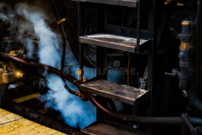 Train stairs with a steam. stock image. Image of train - 165591367