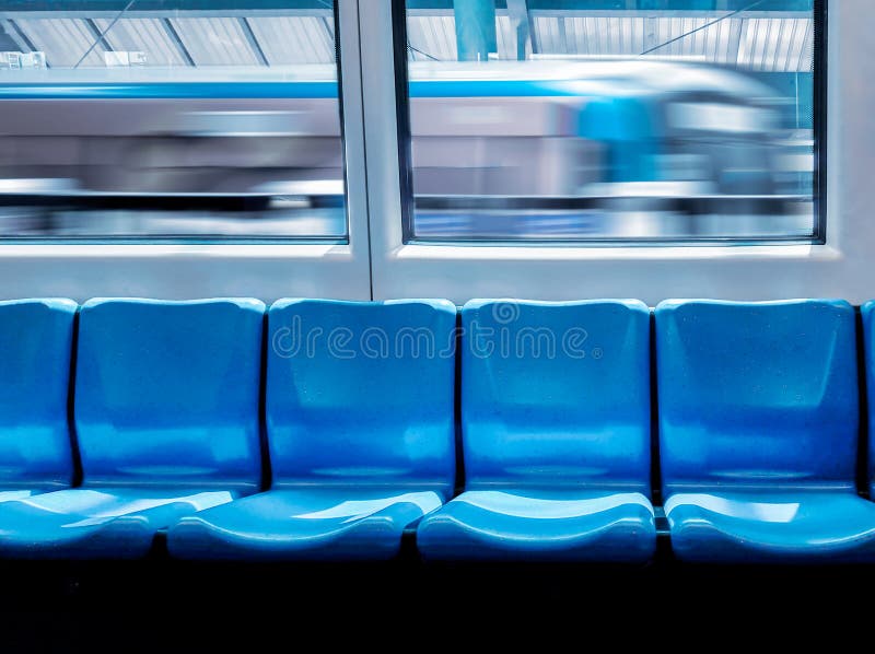 Train Station and Empty Seats Commuter with Blue Color Interior Inside ...