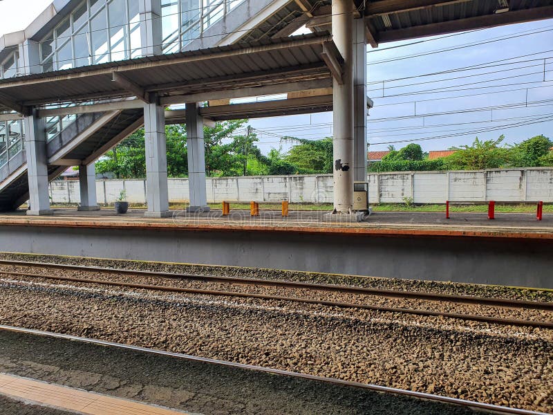 Train Station Platform, Elevated Pedestrian Walkway Over Railway Tracks ...