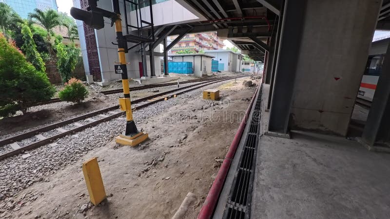 Train Station Platform with Track and Structures Stock Video - Video of ...