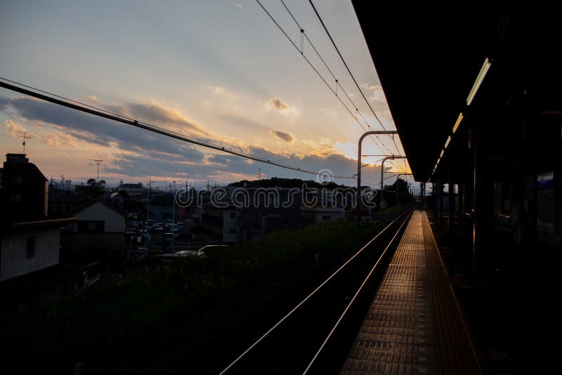 Train Station and Railway in Japan at Sunset Time. Stock Image - Image ...