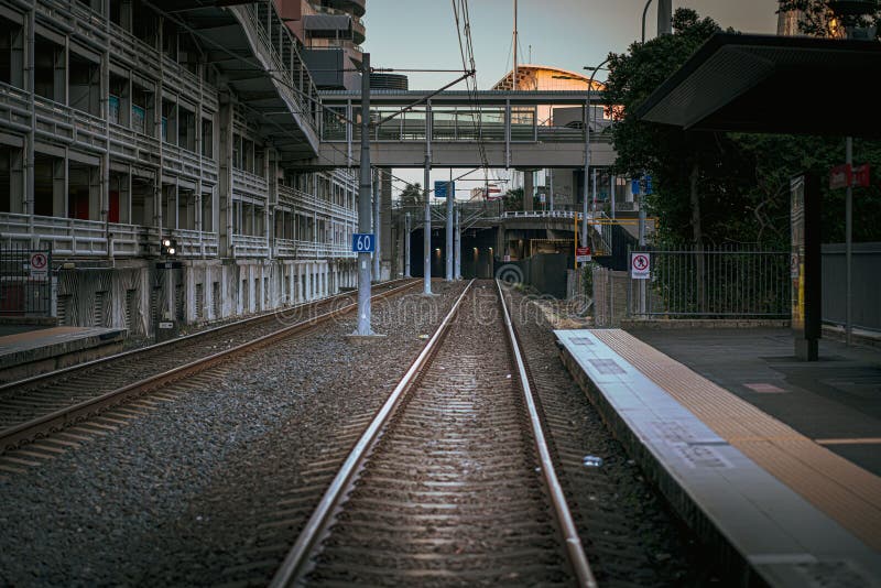 Train Station with Railway Tracks Leading into the Station Stock Photo ...