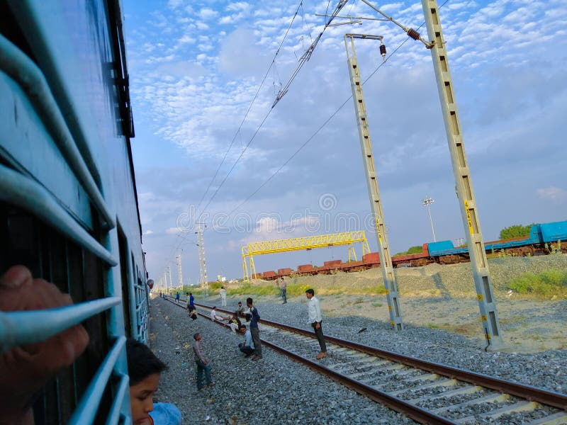 When a train stop in India editorial photography. Image of bridge ...