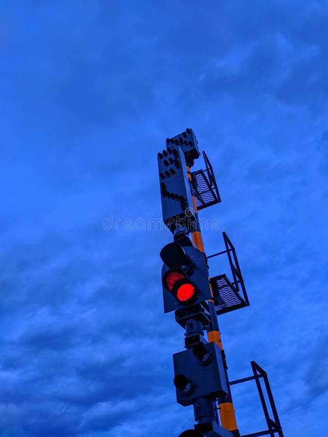 Train Stop Lights in the Evening Stock Image - Image of blue, poster ...